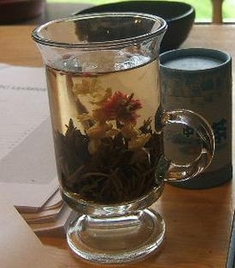 Scallop spitting pearl flowers? Tea by Qitai Tea House — Steepster
